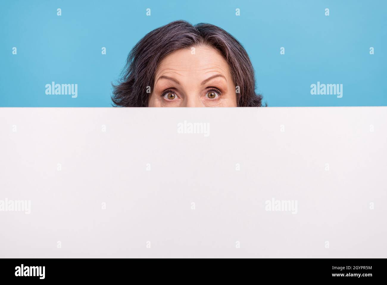 Photo of aged woman close cover half-face paper banner poster empty ...