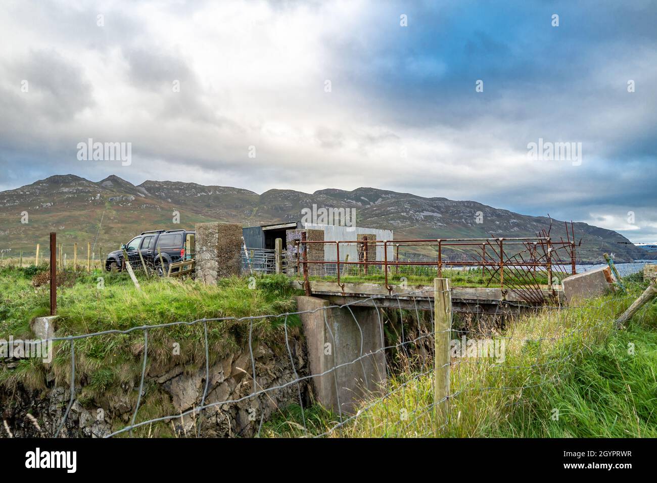 The ruins of Lenan Head fort at the north coast of County Donegal ...