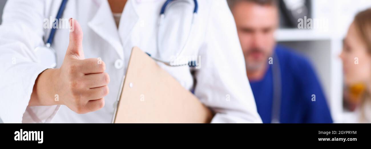 Beautiful smiling female doctor showing OK or confirm sign Stock Photo ...