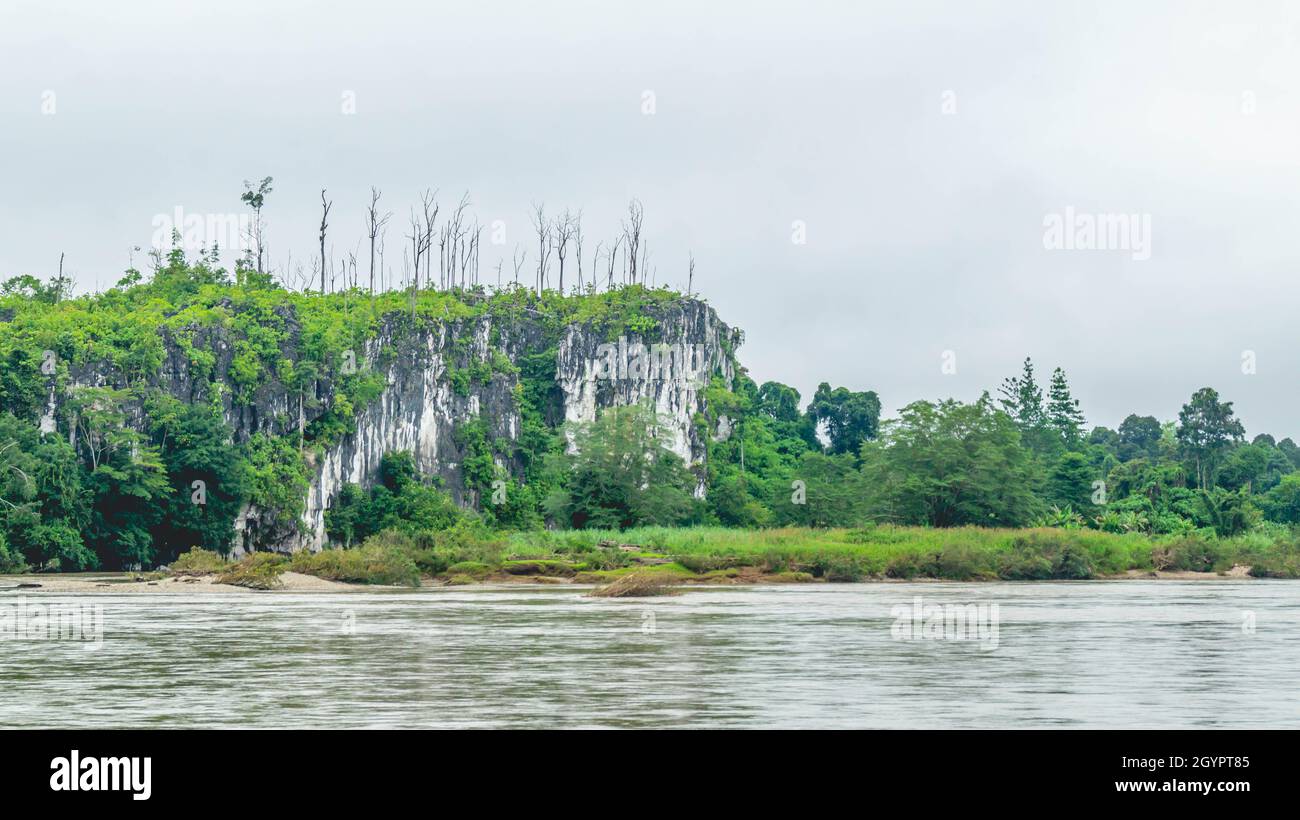 Batu Dinding, iconic landscape of limestone wall on the upper Mahakam ...