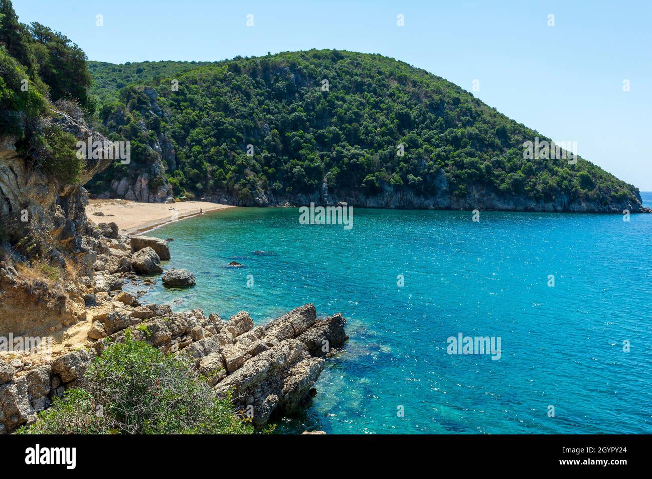 Quiet, hot sandy beach, known as Kantouni Messinia, Greece. A small ...