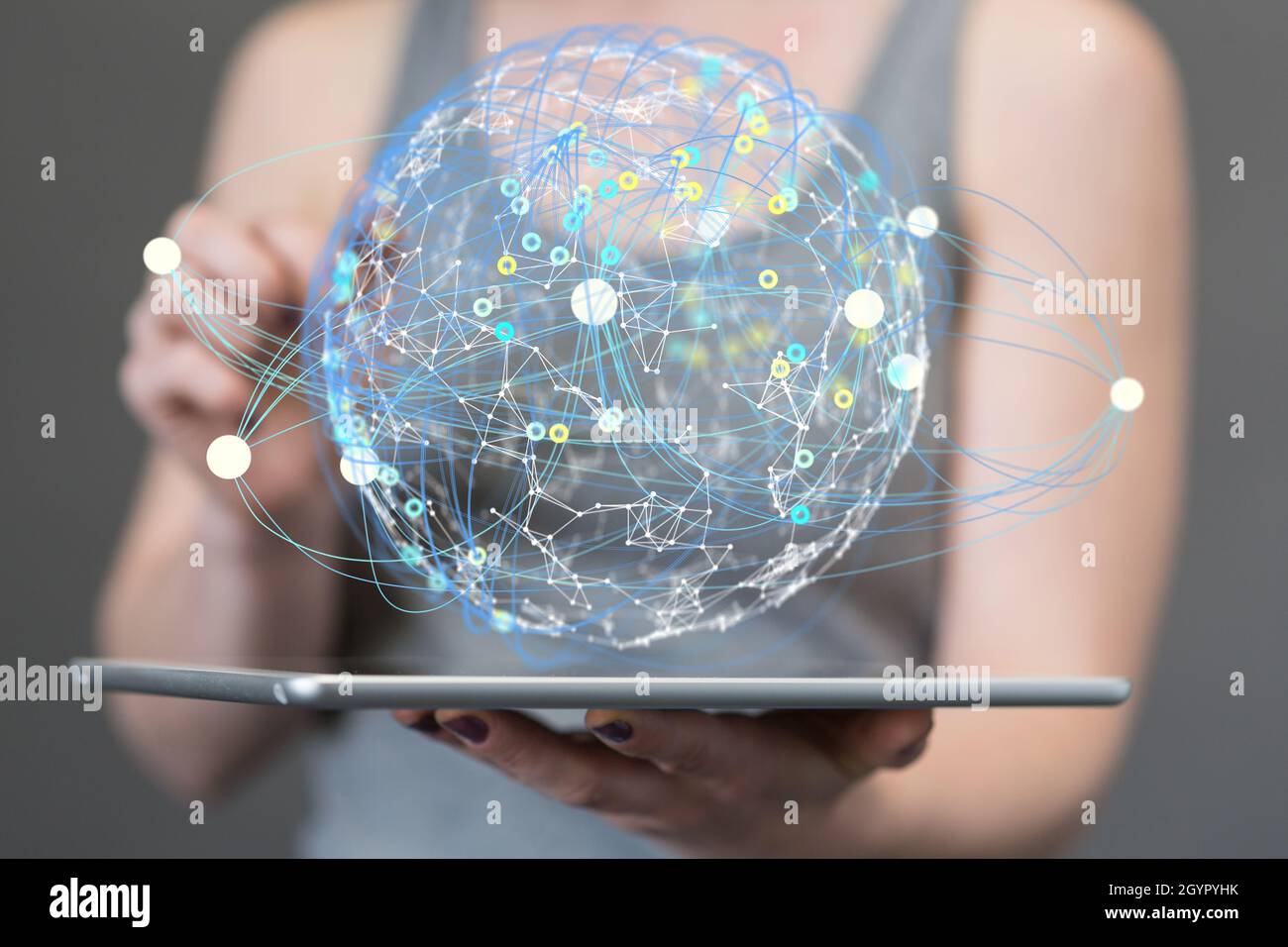 3D rendering of digital globe floating on hand holdingtablet- Digital ...