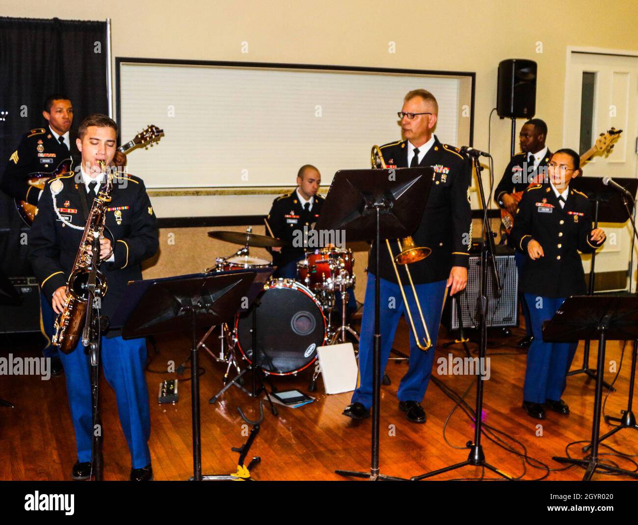 Soldiers with the 1st Armored Division band play music during an ...