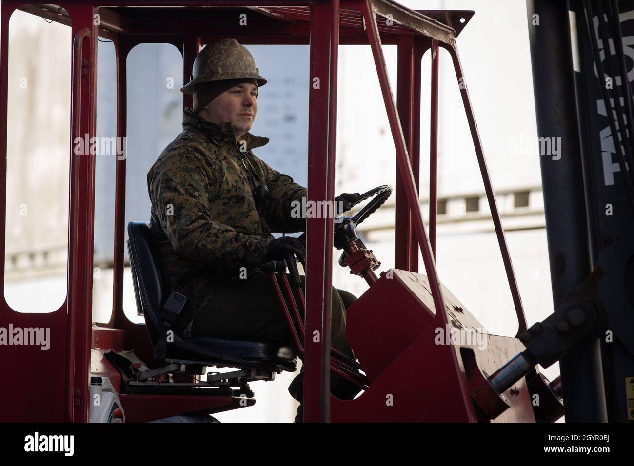 Marine Sgt. Justin Reeves operates a forklift in support of exercise ...
