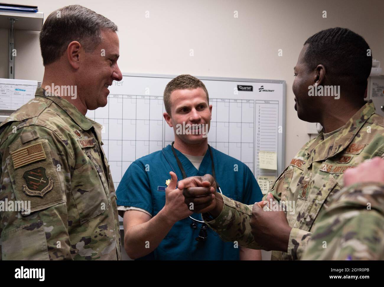From left, Col. Thomas Falzarano, 21st Space Wing commander, Maj ...