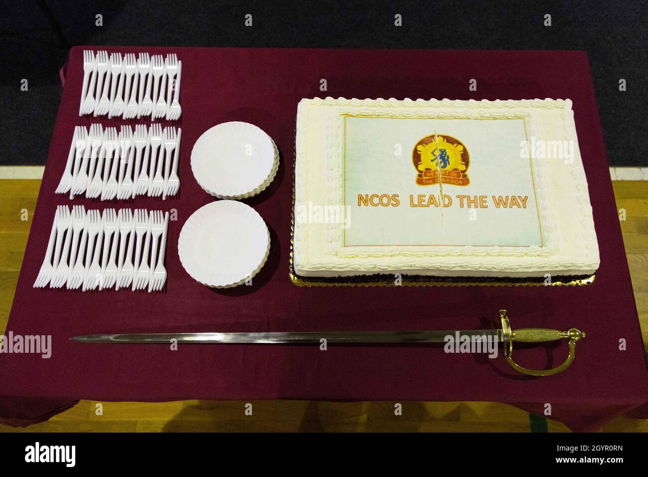 A saber and cake await the attendees as part of a noncommissioned ...