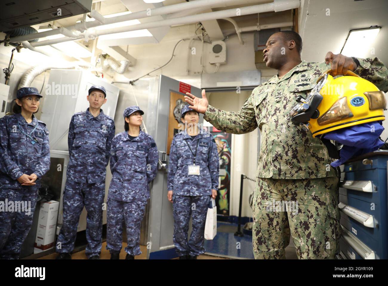 KURE, Japan (Jan. 23, 2020) -- Navy Diver 1st Class Ellex Sturkey gives ...