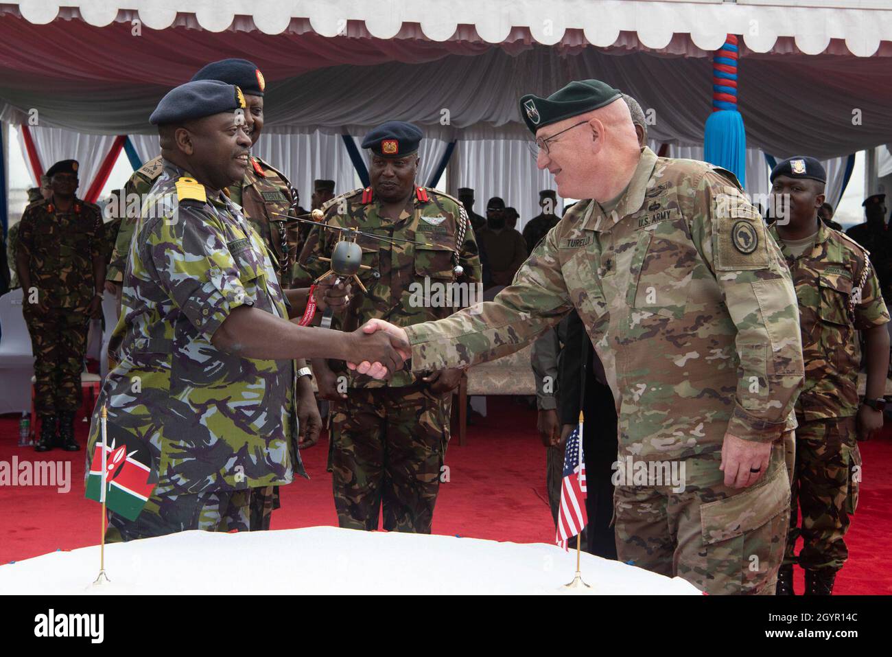 U.S. Army Maj. Gen. Michael D. Turello, right, commanding general of ...