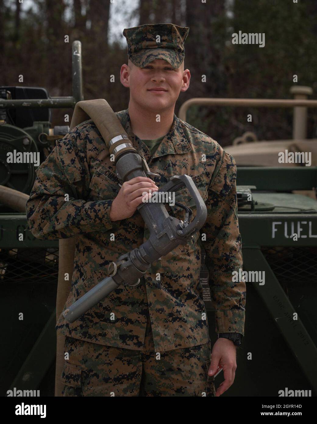 U.S. Marine Corps Lance Cpl. Nathan Cummings with 8th Engineer Support ...