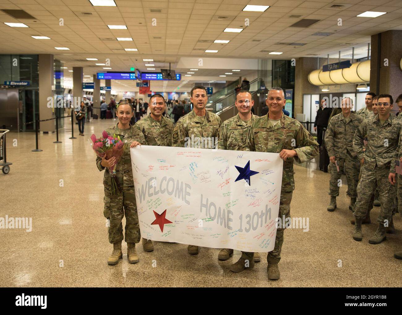 Members of the 130th Engineering and Installations Squadron, pose for a ...
