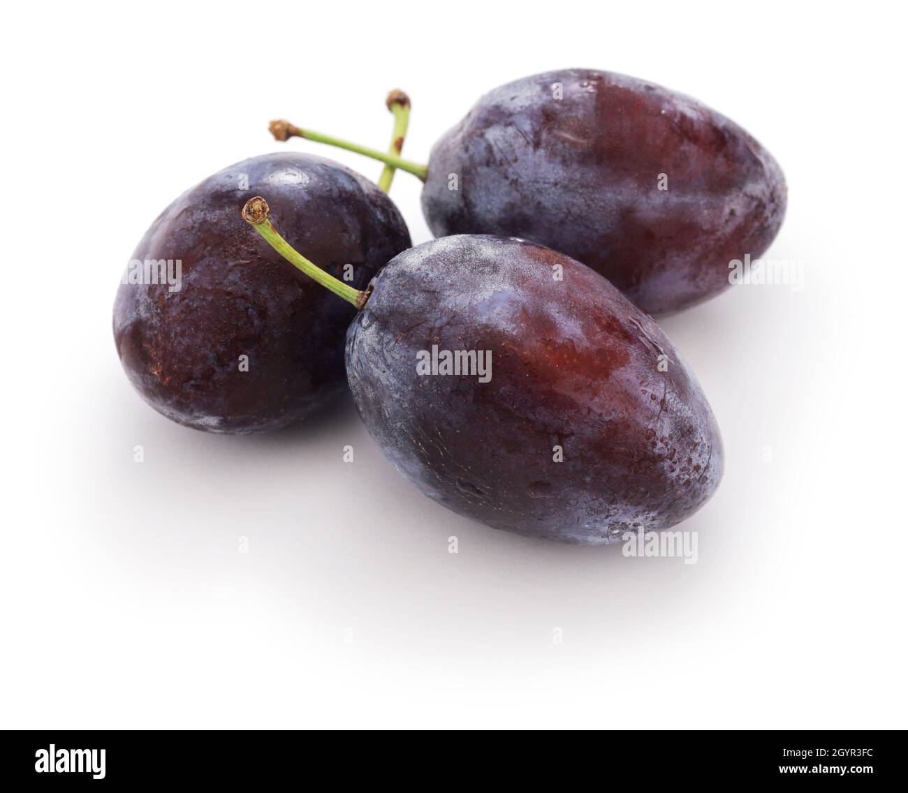 fresh prune plums isolated on white background Stock Photo - Alamy