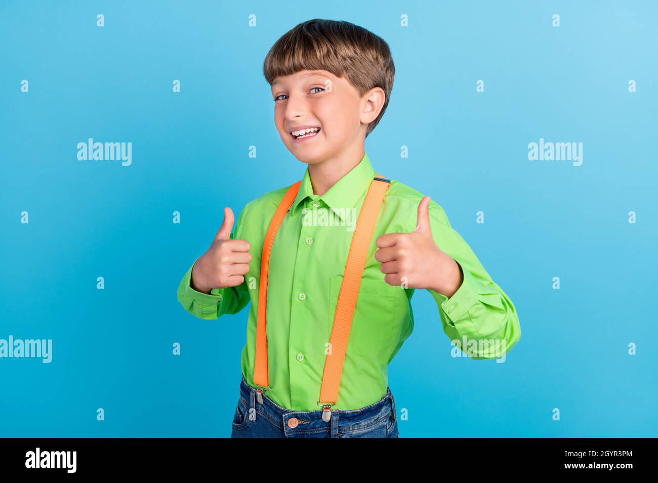 Photo of cool happy positive small boy show thumb up recommend like ...