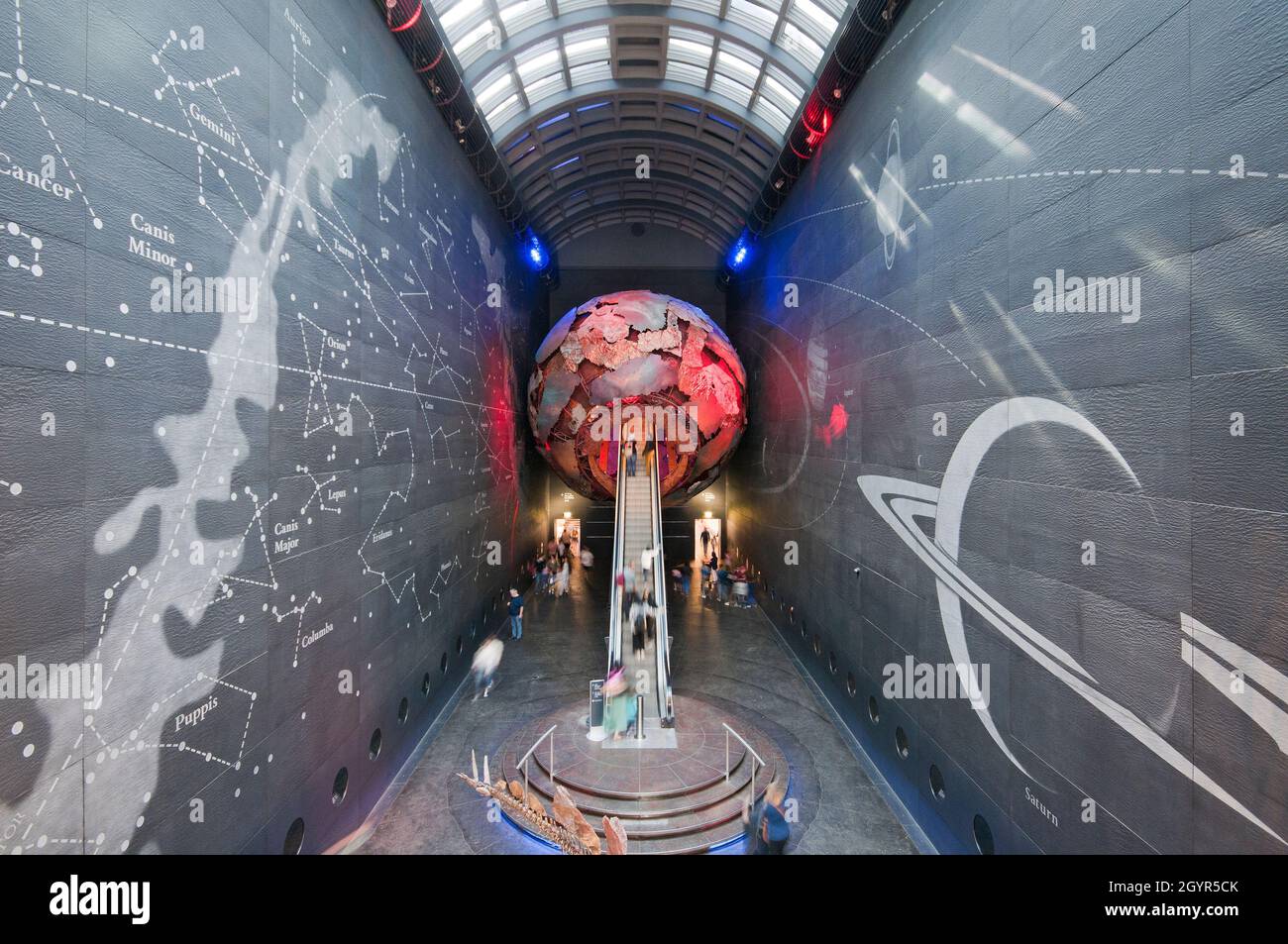 The Earth Hall with escalator leading up into the red globe, Natural ...