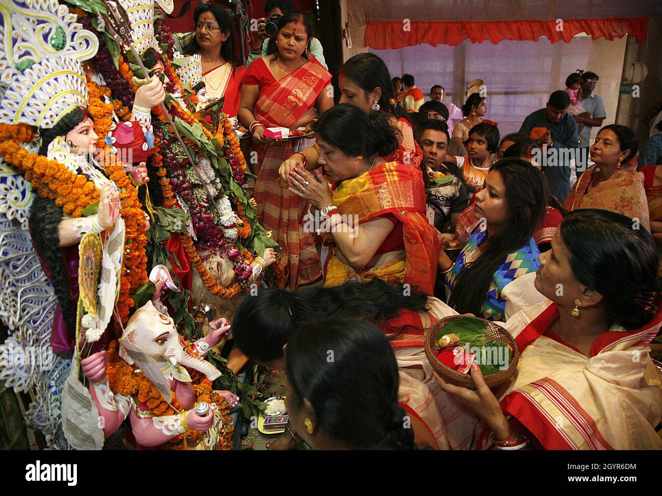 Indian Bengali women take part in a sindoor khela during the Durga puja ...
