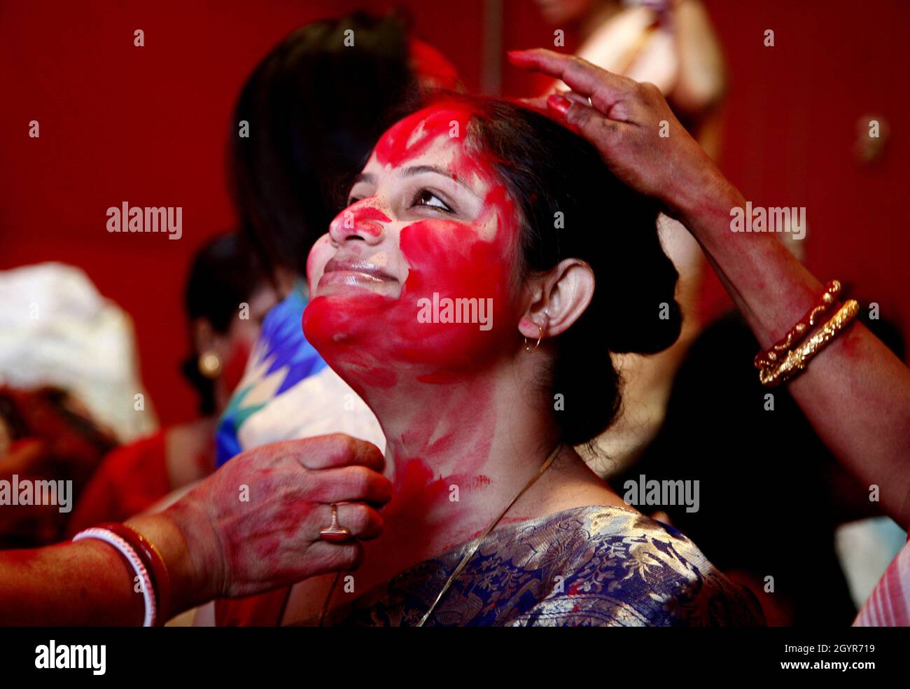 Indian Bengali women take part in a sindoor khela during the Durga puja ...