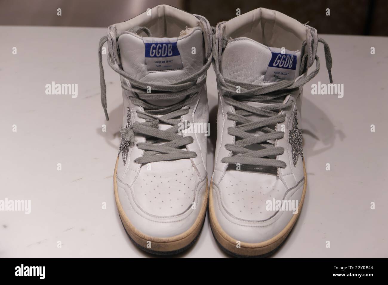 SHOES ON DISPLAY AT GOLDEN GOOSE FASHION STORE Stock Photo - Alamy