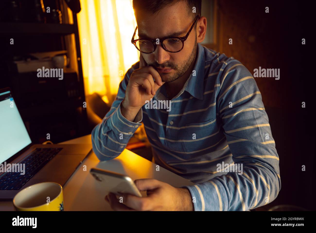 Man working in the room Stock Photo - Alamy