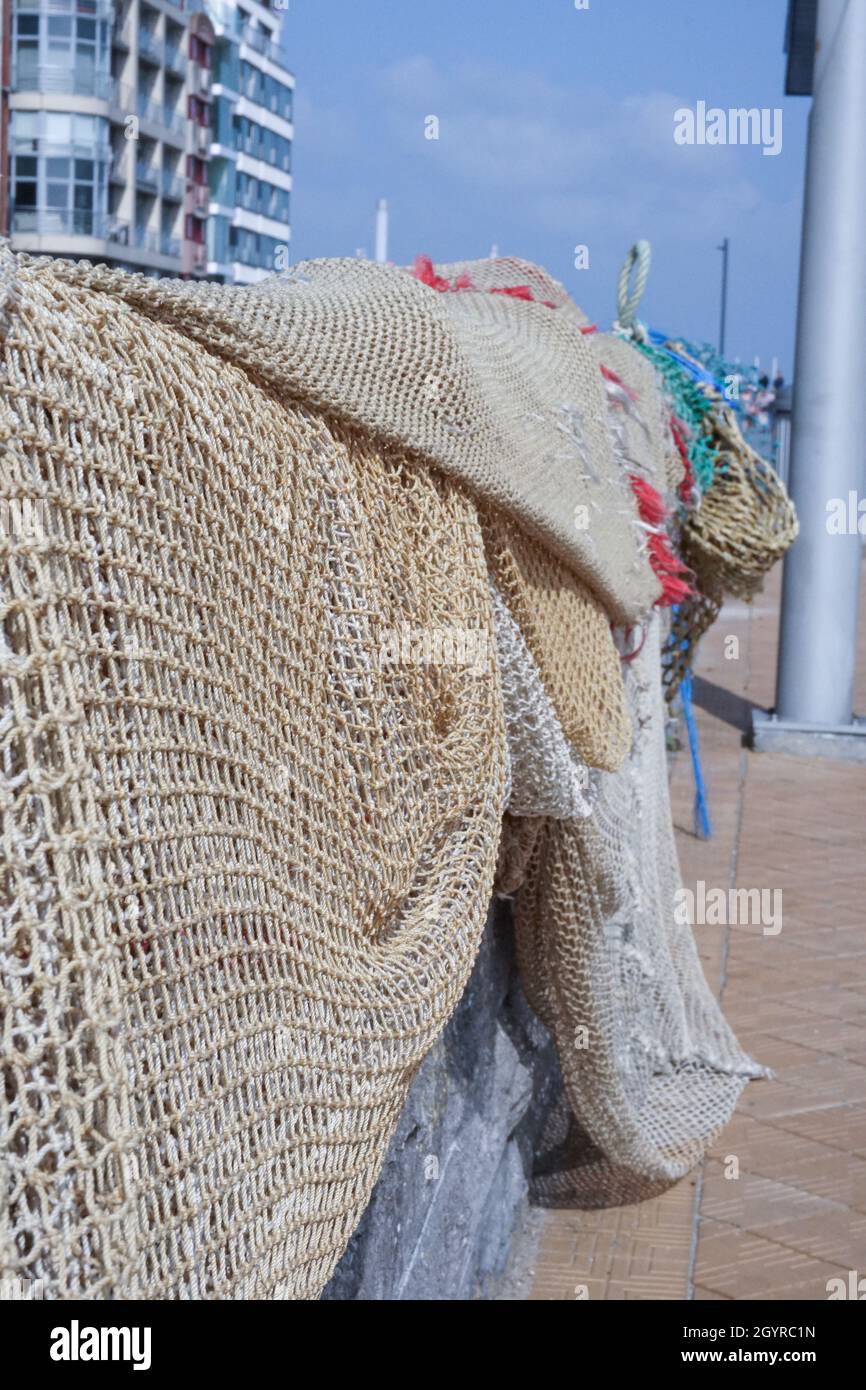Ship at the port covered with burlap fabric Stock Photo - Alamy