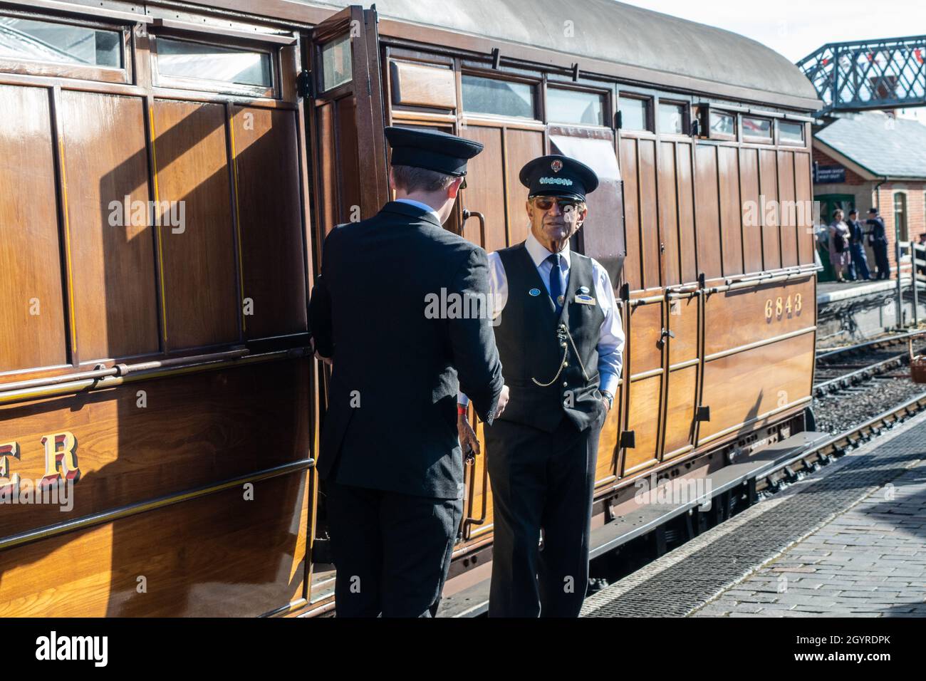 Old fashioned train conductor hi-res stock photography and images - Alamy