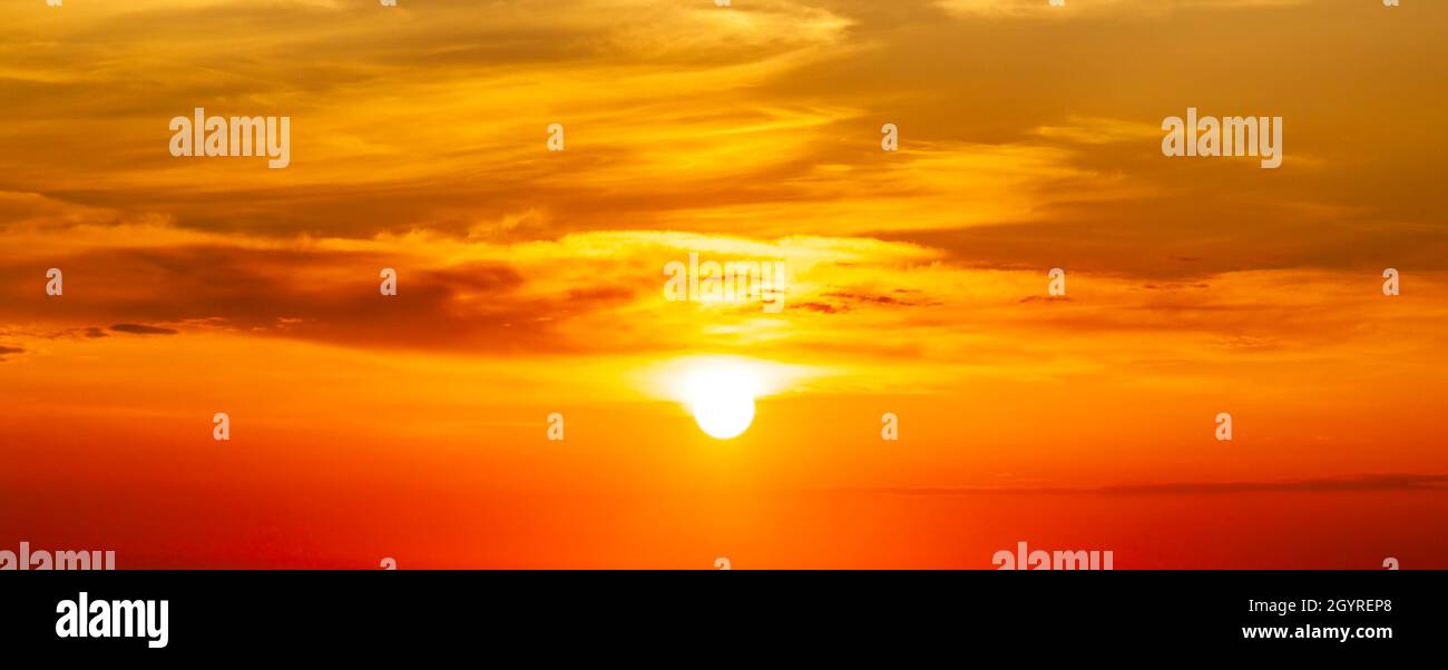 Cloudy sky with setting sun hi-res stock photography and images - Alamy