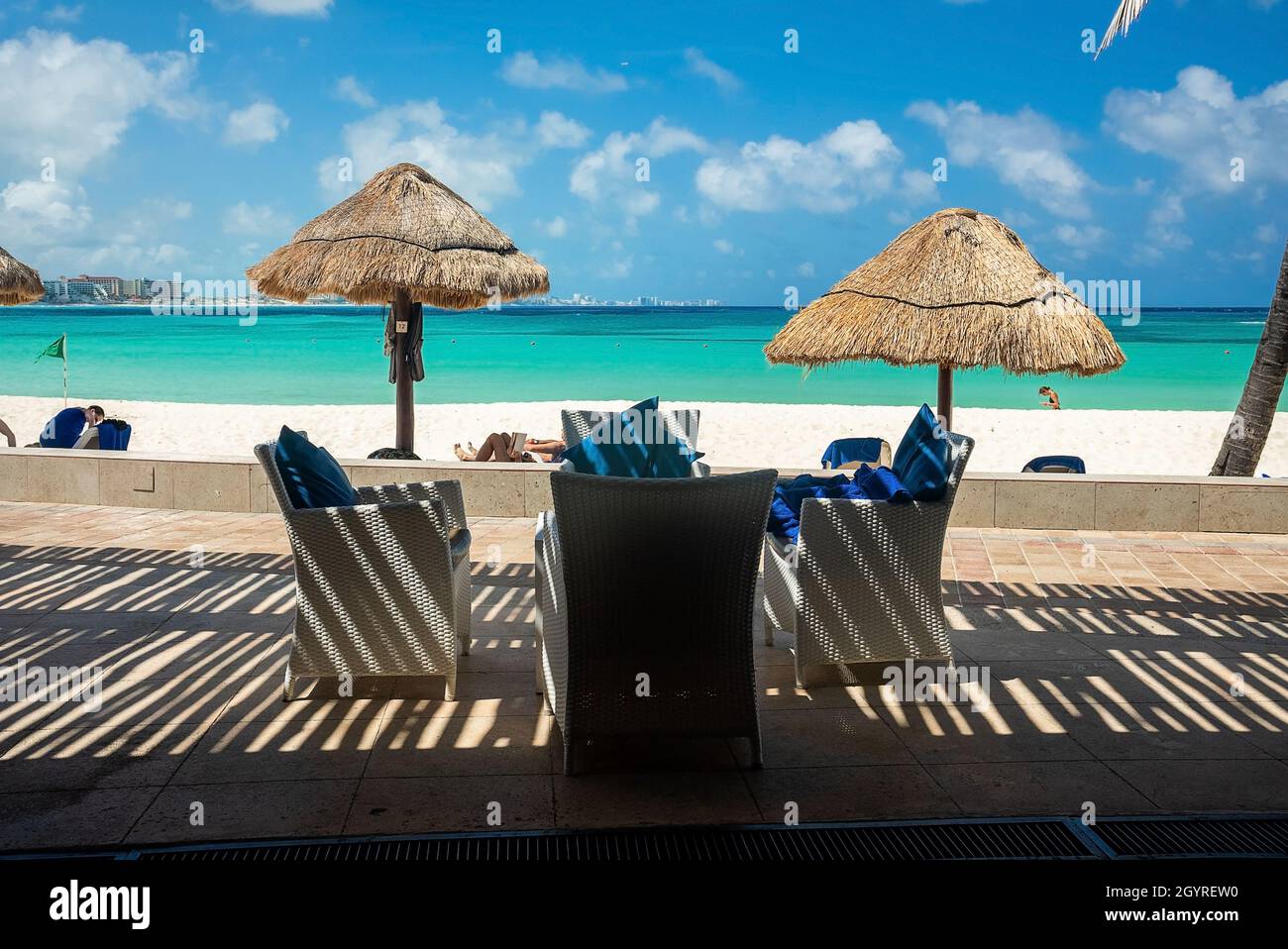 Resort or hotel with a view of beautiful beach from the patio Stock ...