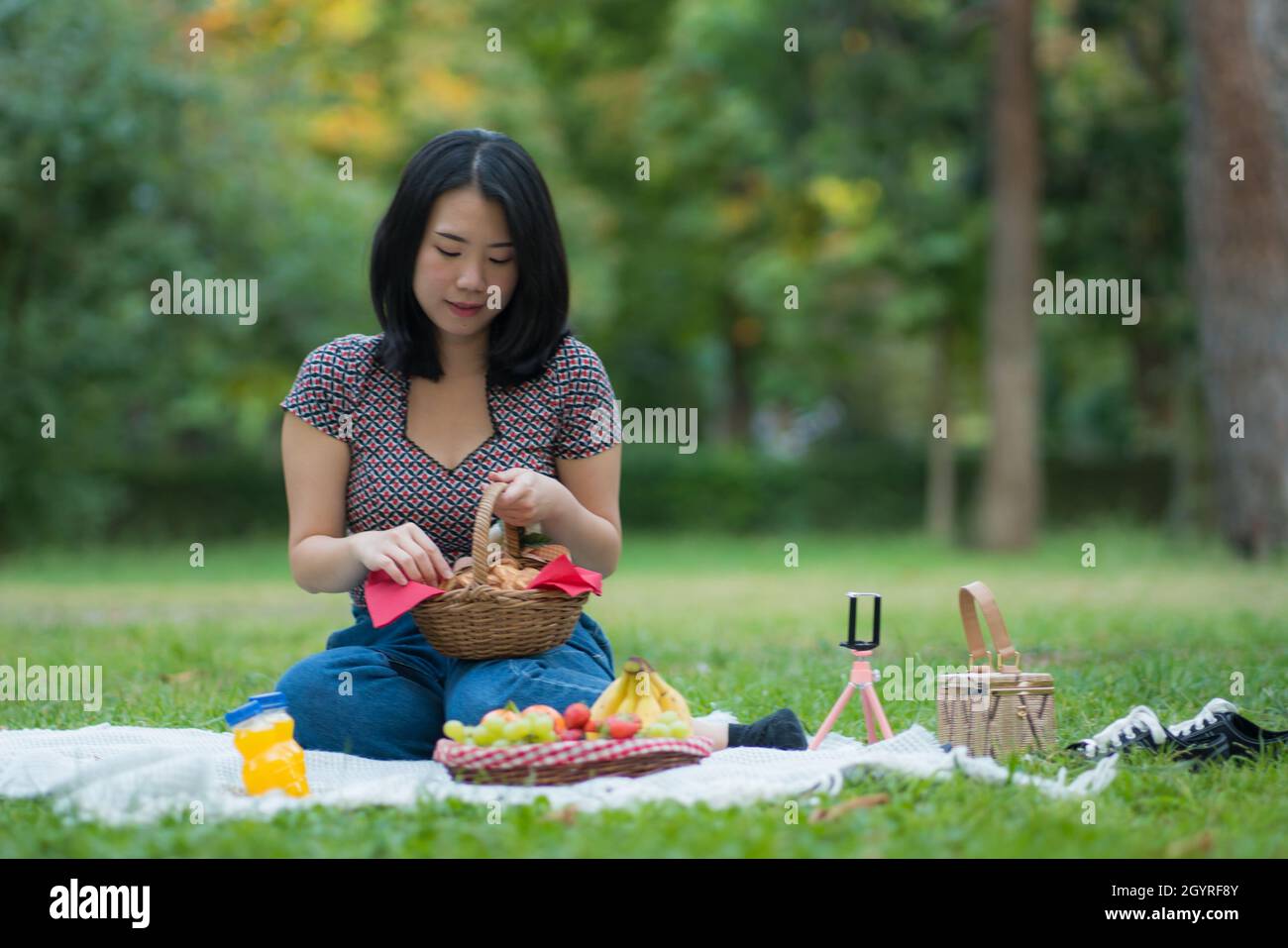 Autumn picnic at city park - lifestyle portrait of young happy and ...