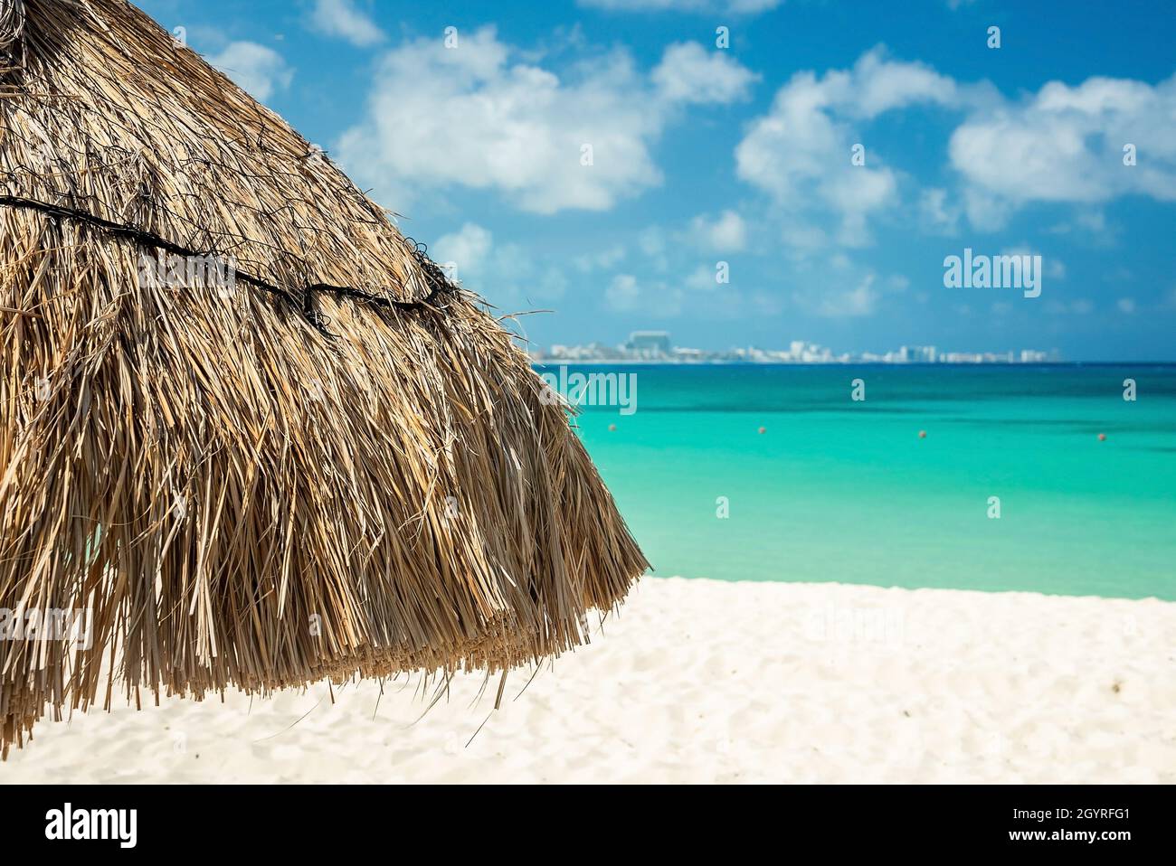 Straw canopy on sand at beach with beautiful sea water surface Stock ...