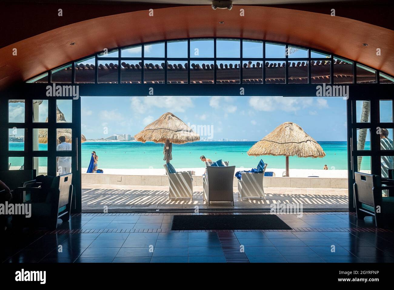 Resort or hotel with a view of beautiful beach from the patio or ...