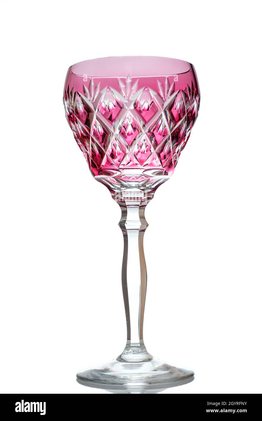 Violet crystal wine glass in back lit Stock Photo - Alamy