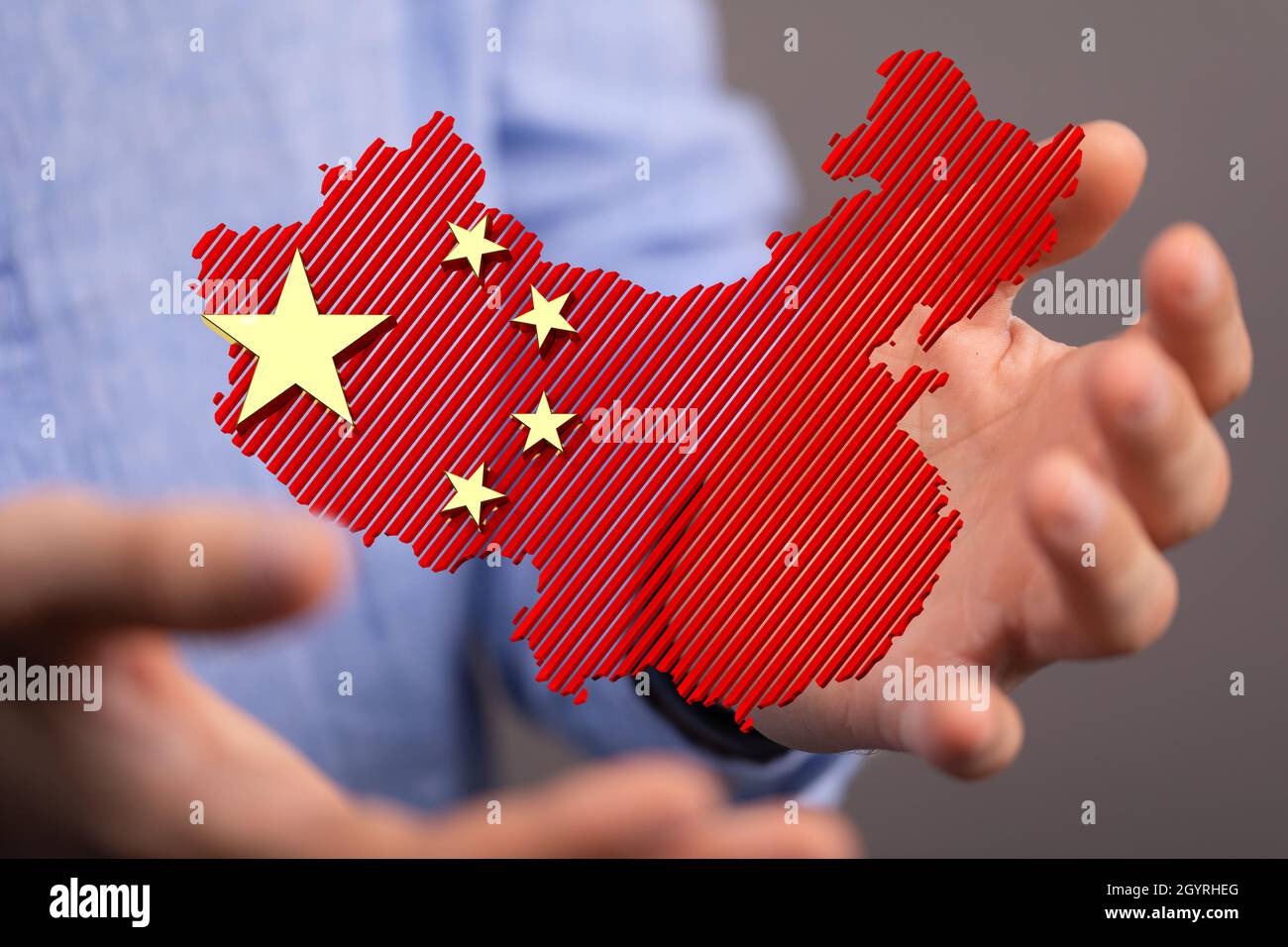 3d illustration of the map of China floating near hand Stock Photo - Alamy