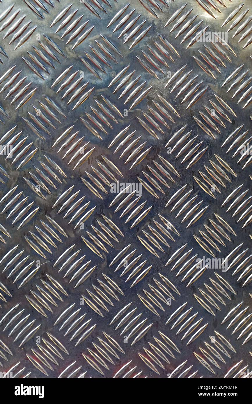 Diamond pattern metal floor texture background Stock Photo - Alamy