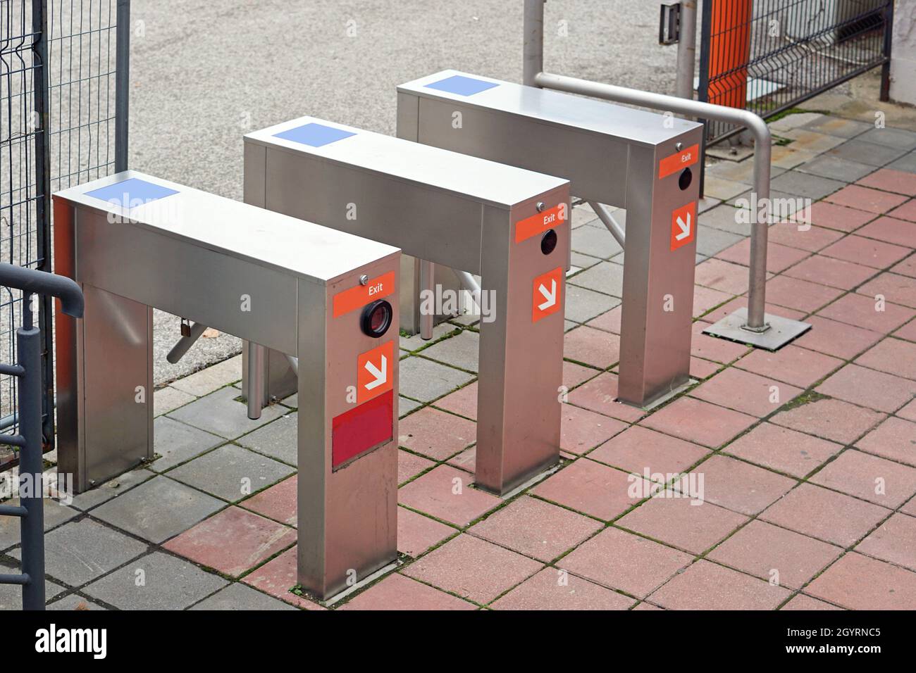 Turnstile control access pass gate to venue Stock Photo - Alamy