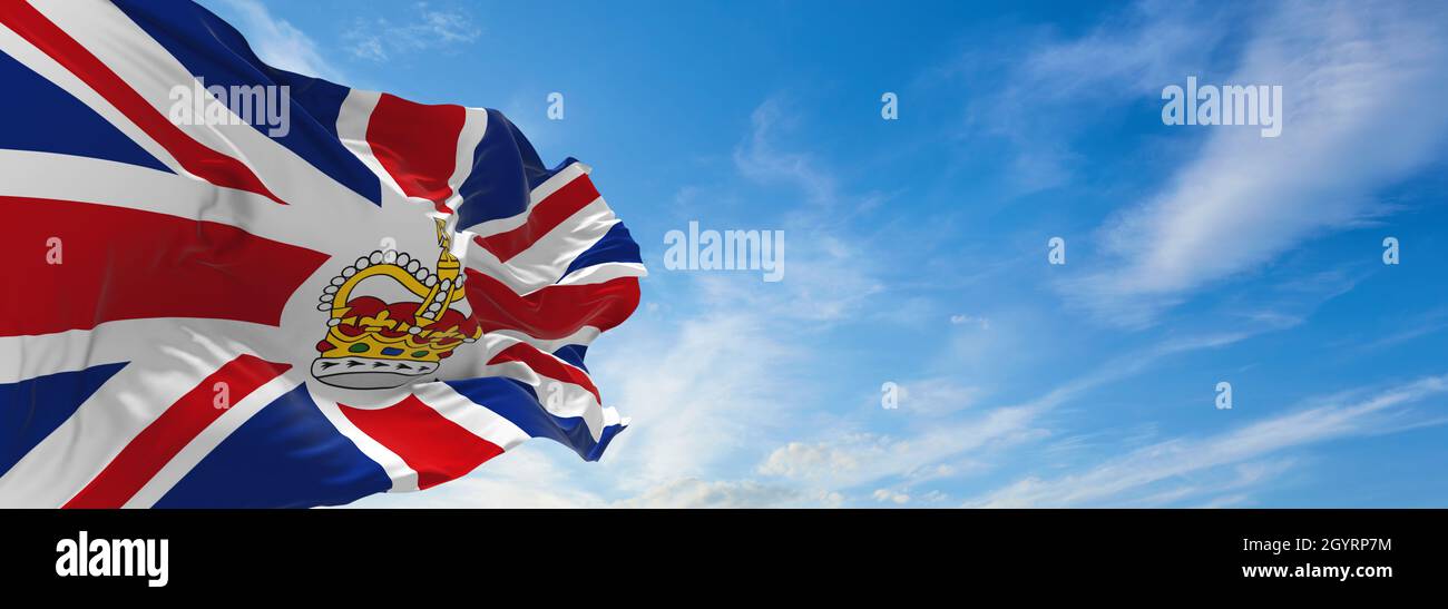 flag of UK Consular at cloudy sky background on sunset. panoramic view ...
