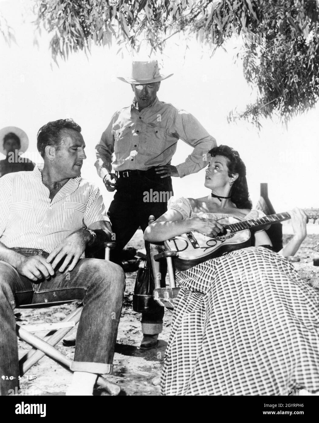JANE RUSSELL sitting with her husband ROBERT / BOB WATERFIELD on set ...