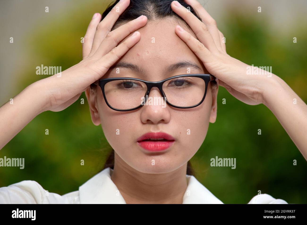 Beautiful Asian Female And Anxiety With Glasses Stock Photo - Alamy