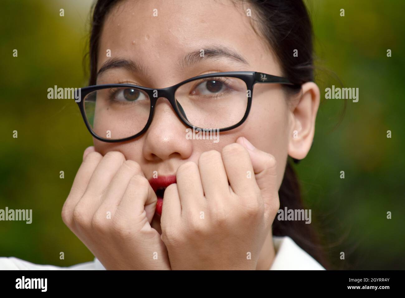 Attractive Adult And Fear Wearing Glasses Stock Photo - Alamy