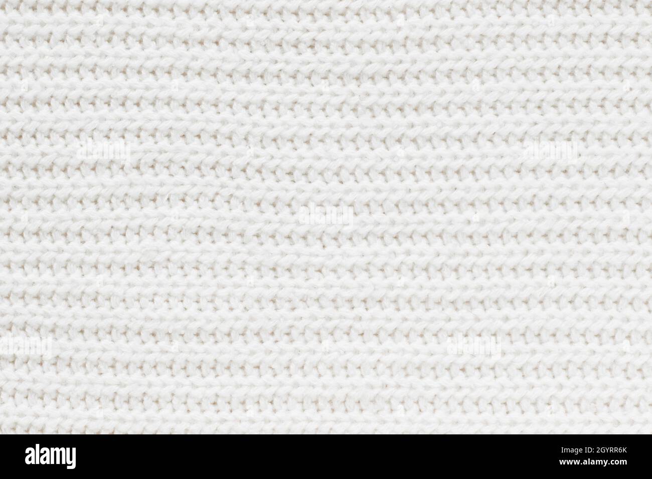 Wool white knitted texture close up Stock Photo - Alamy