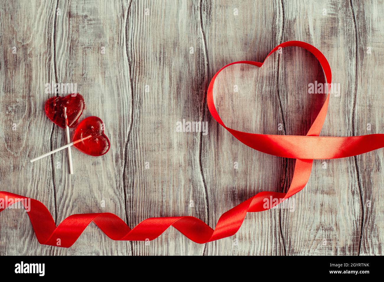 Valentine's day card with candy hearts, decor and ribbon Stock Photo ...