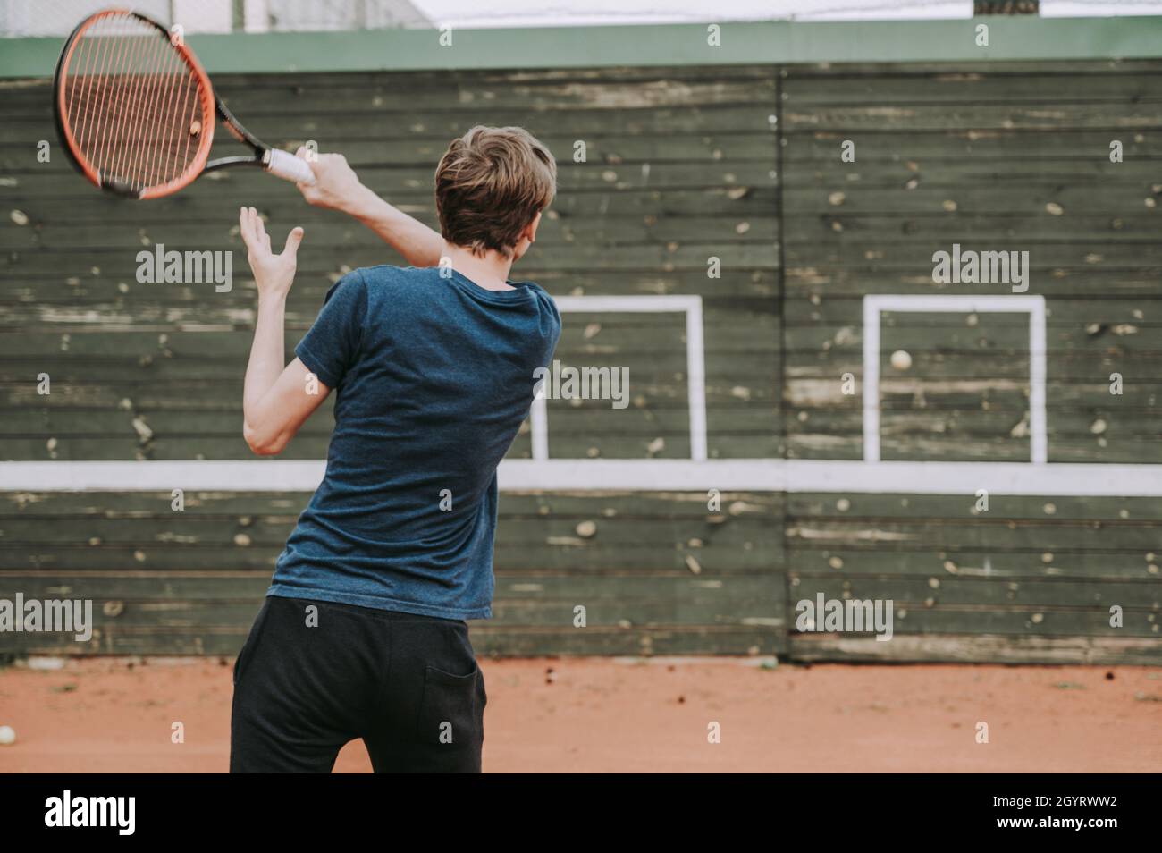 The process of training the game of tennis. Exercises against the wall ...
