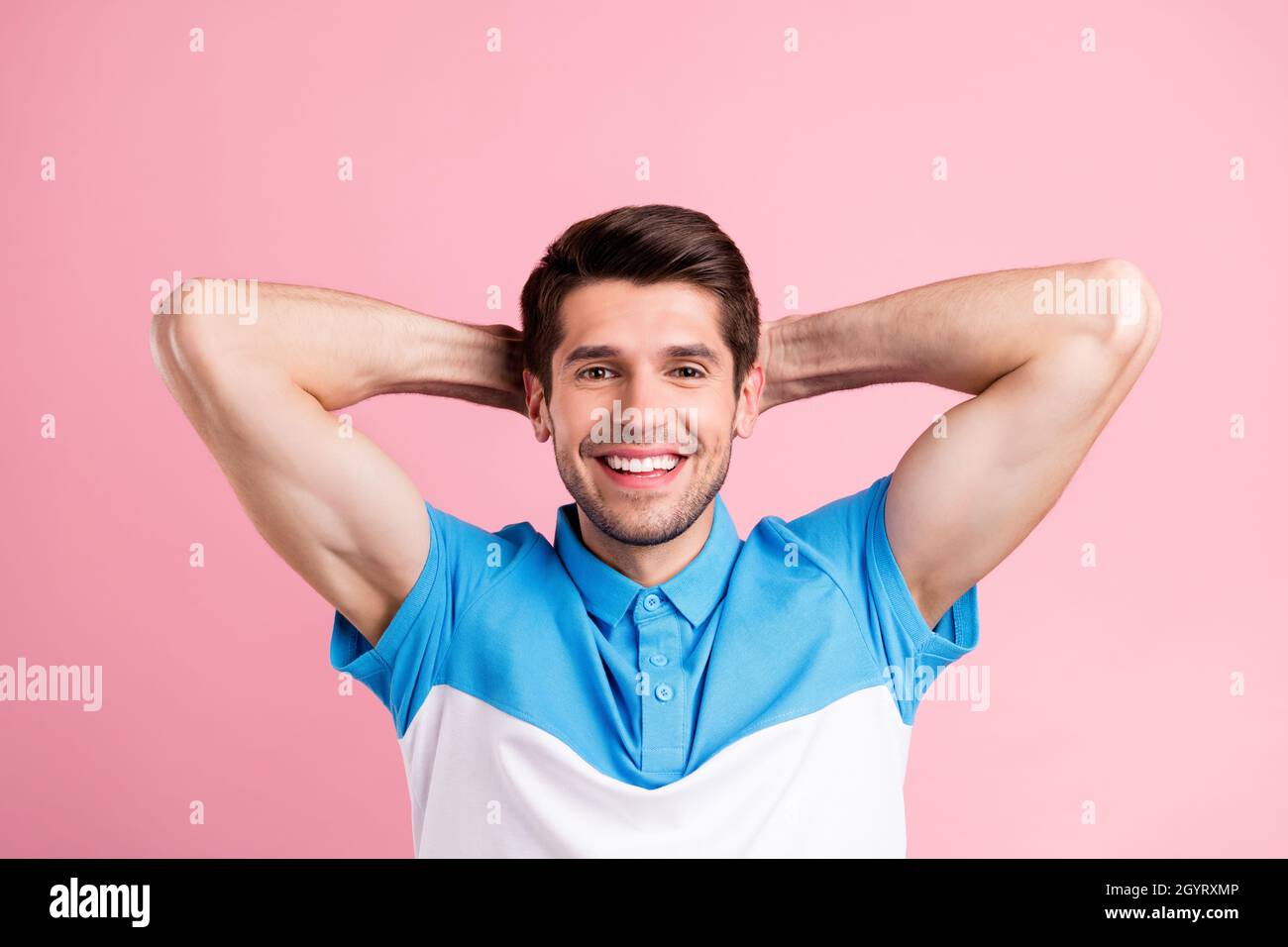 Portrait of attractive calm cheerful brunette guy resting good mood ...