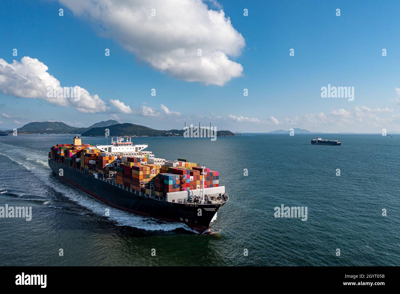 Aerial view of fully loaded container ship arriving Hong Kong Stock ...