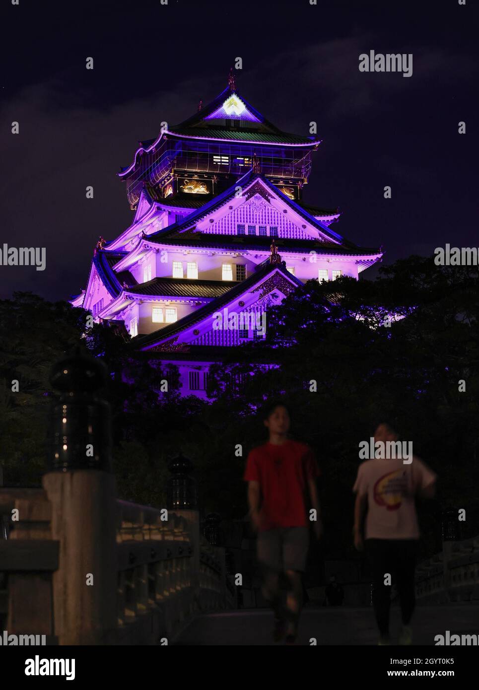 Osaka, Japan. 09th Oct, 2021. Osaka Castle is lit up in purple on Oct ...