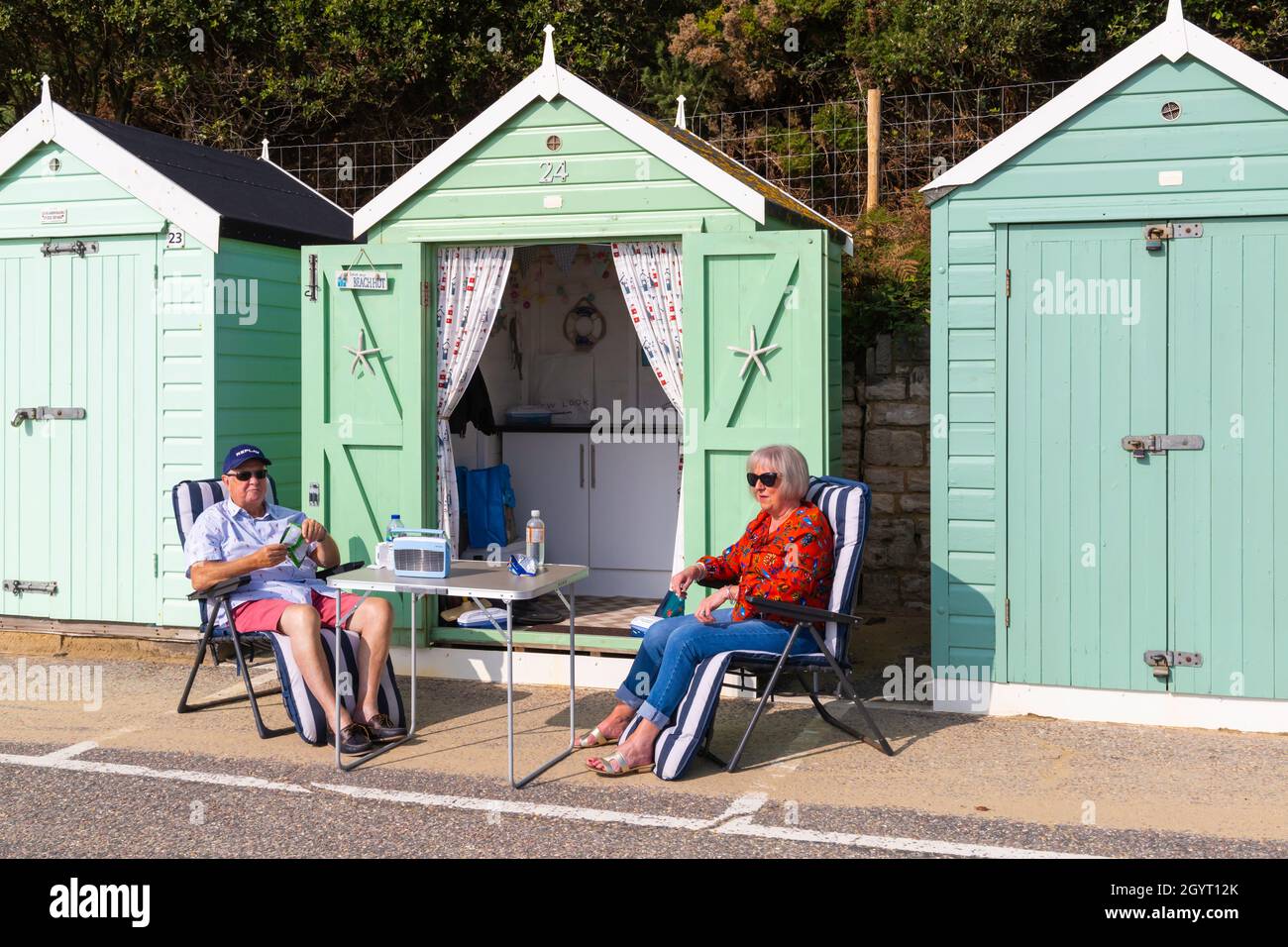 Lady relaxing in a beach hut hi-res stock photography and images - Alamy