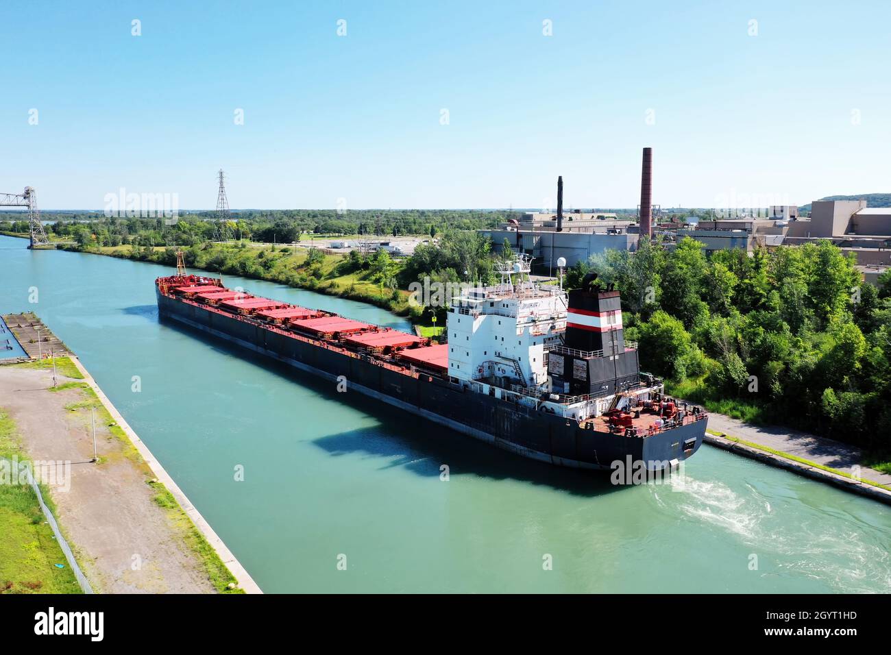 An aerial view of a Lake Freighter leaving a lock in the Welland Canal ...