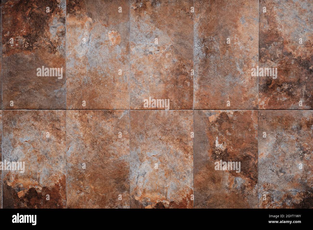 Rusty slate stone tiled wall texture or background Stock Photo - Alamy
