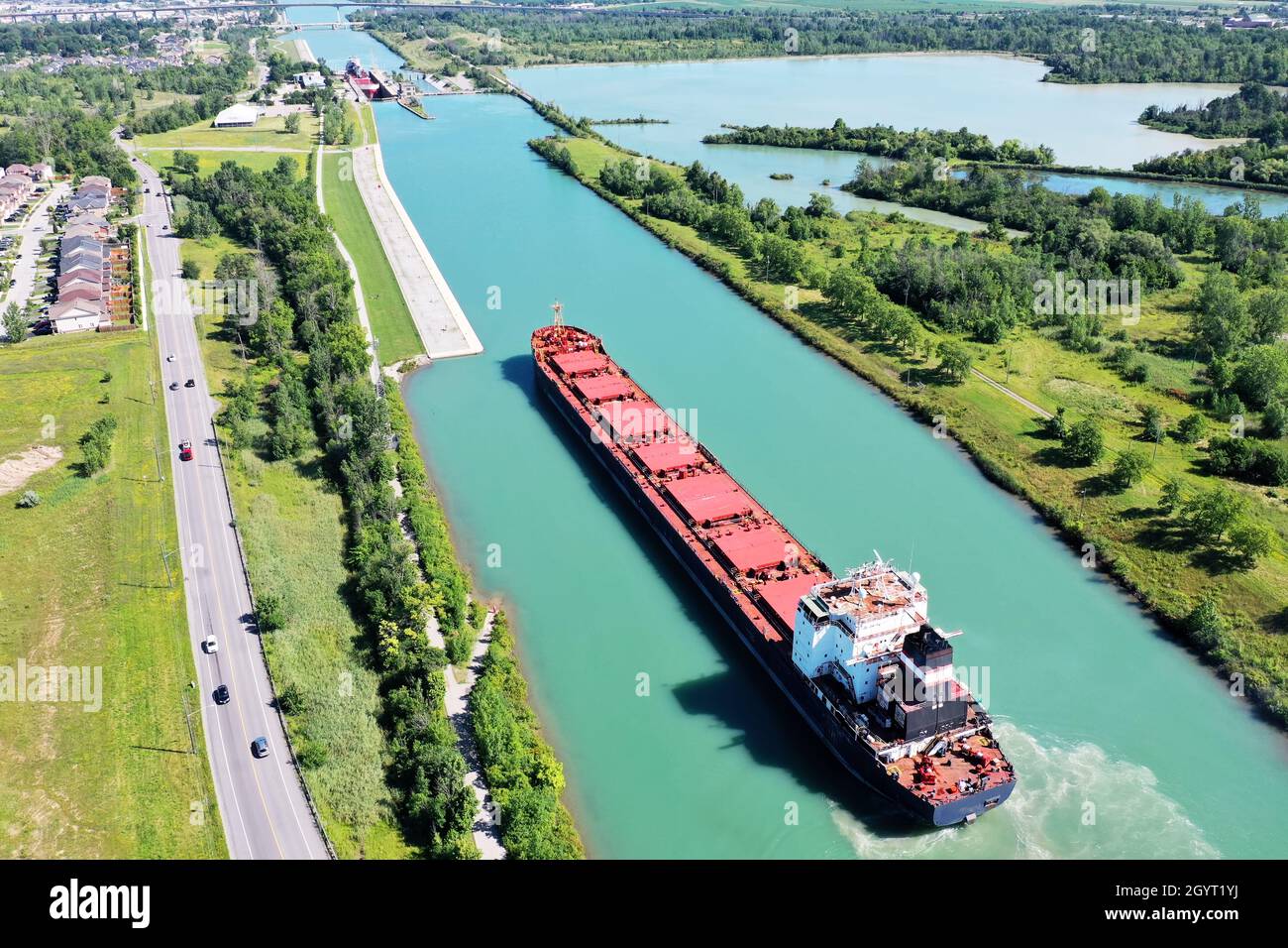 An aerial of a Lake Freighter sailing in the Welland Canal, Canada ...