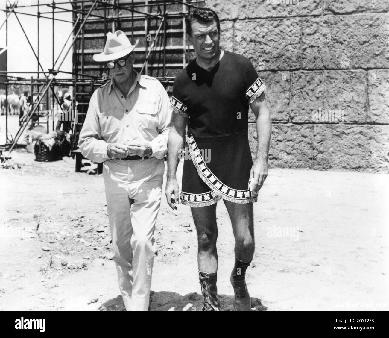 Director Raoul Walsh And Richard Egan On Set Candid During Filming Of