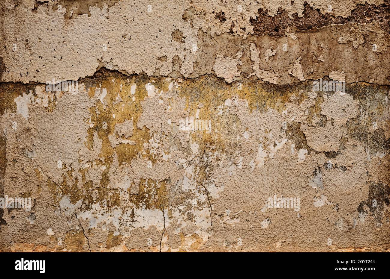 Old ruin wall with peeling plaster, grunge background or texture Stock ...