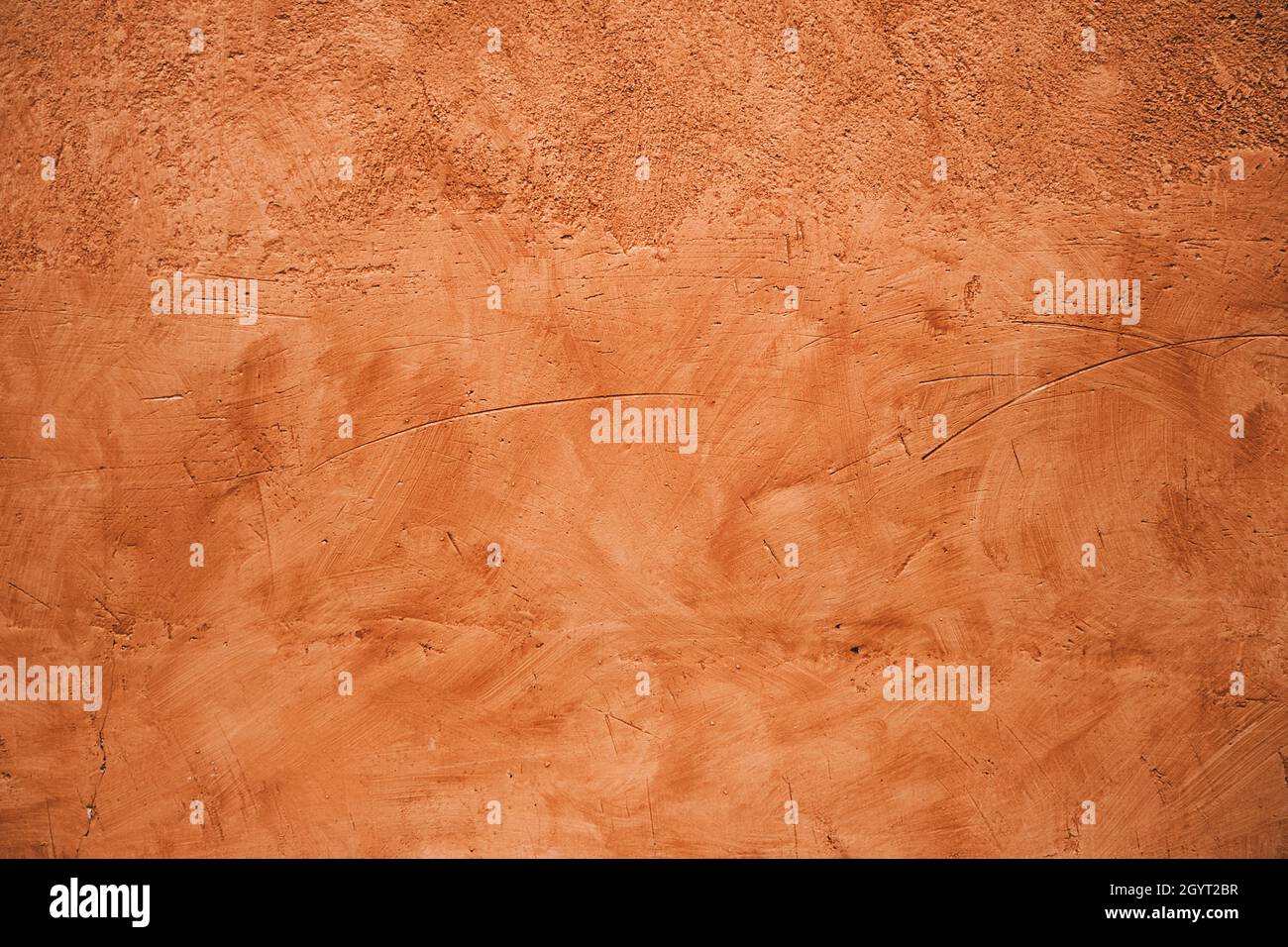 Terracotta colored plaster wall, rustic background or texture Stock ...