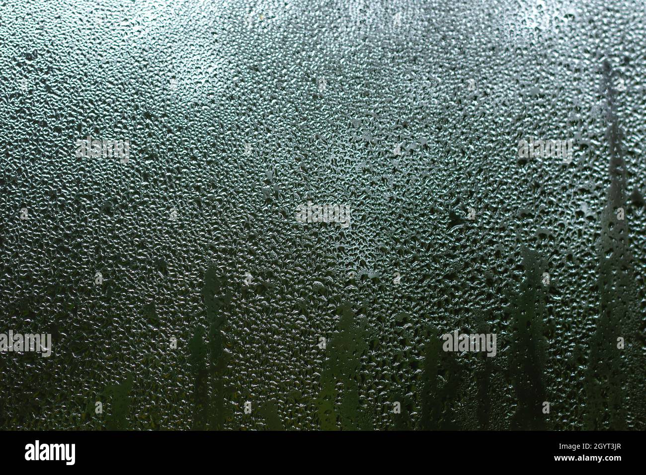 Condensation droplets on a window pane close up Stock Photo - Alamy